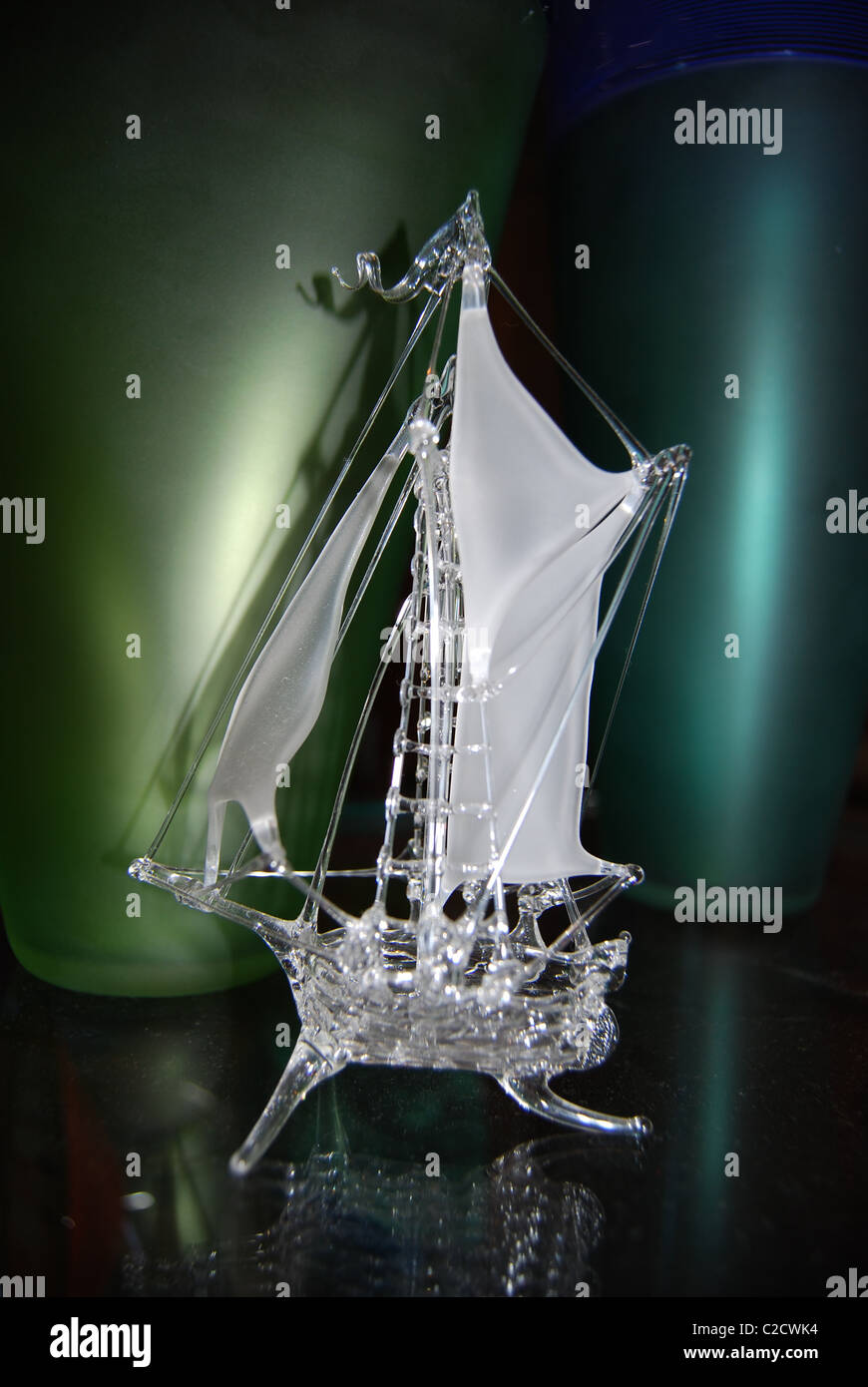 Small hand made glass ship Stock Photo - Alamy