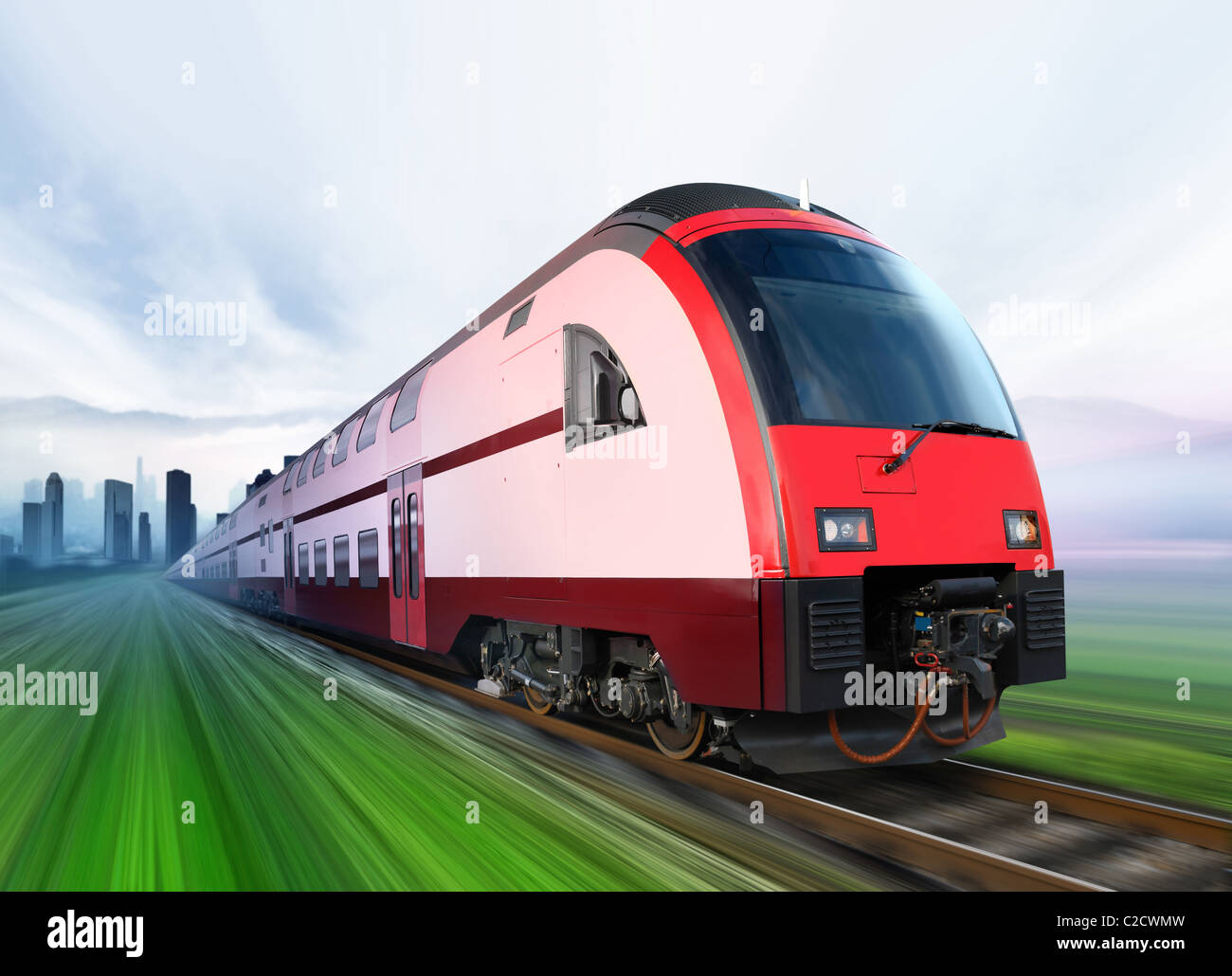 super streamlined train with motion blur moves from city Stock Photo ...