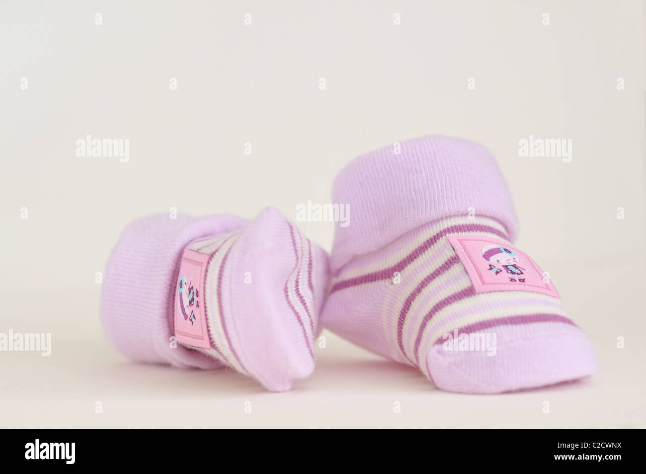 Baby girl booties hi-res stock photography and images - Alamy