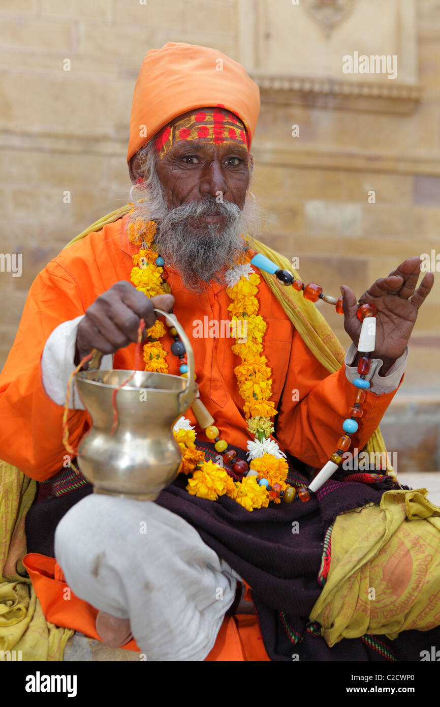 Portrait of a sadhu, a Hindu holy man, dressing traditional clothes ...