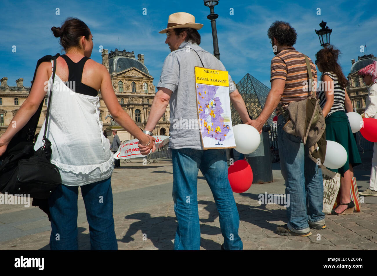 Crowd people behind chain hi-res stock photography and images - Alamy