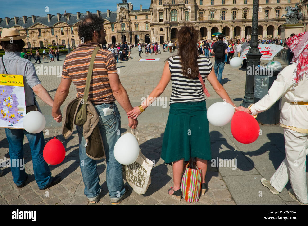 Crowd people behind chain hi-res stock photography and images - Alamy