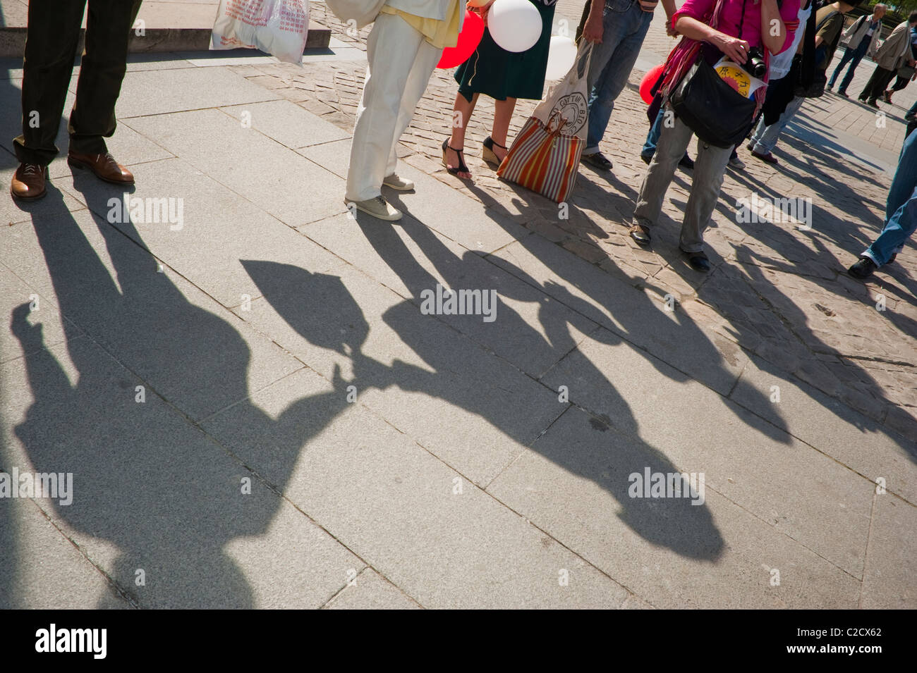 Human shadows on the ground hi-res stock photography and images - Alamy