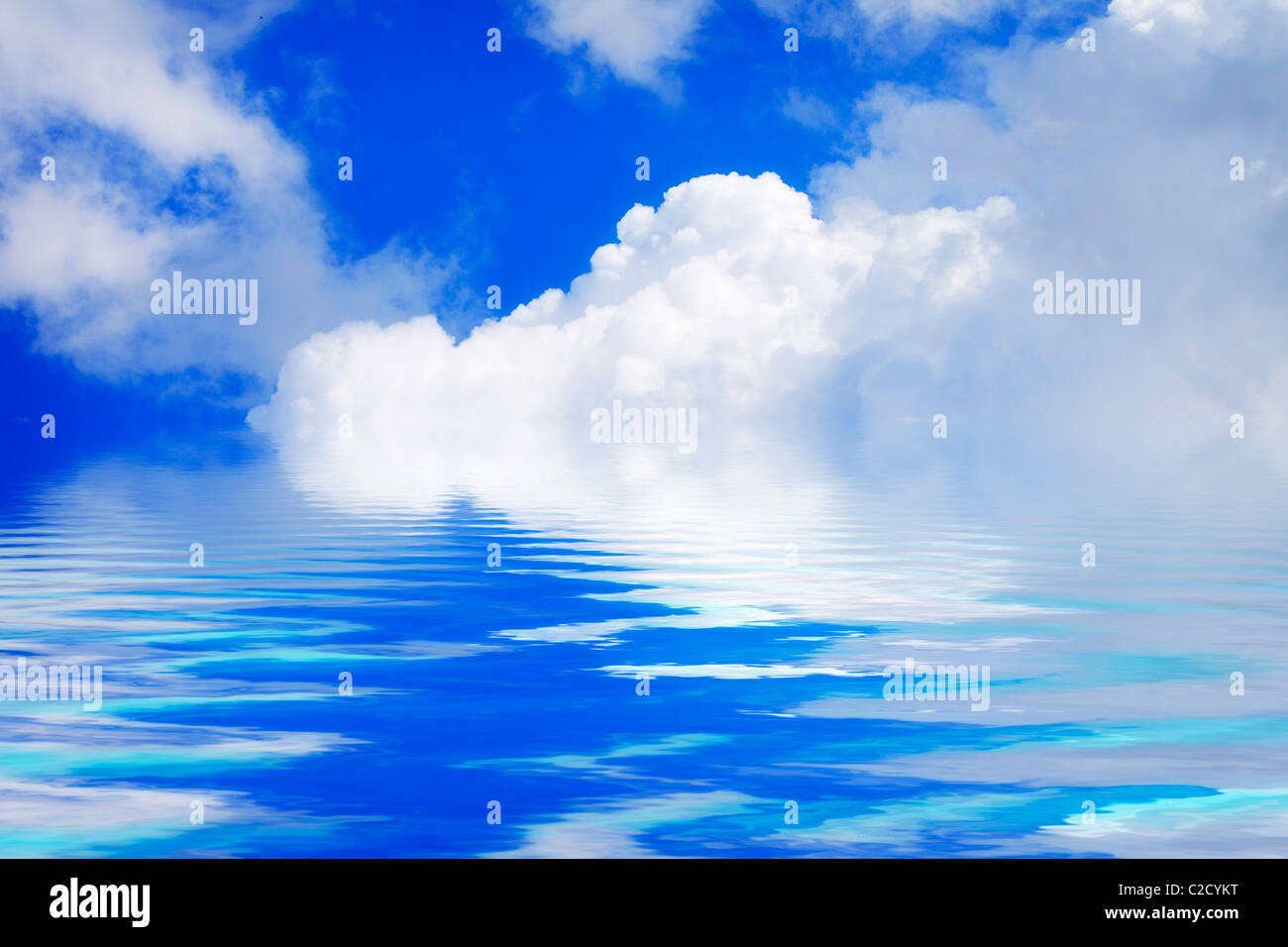 Blue sky reflecting on water Stock Photo - Alamy