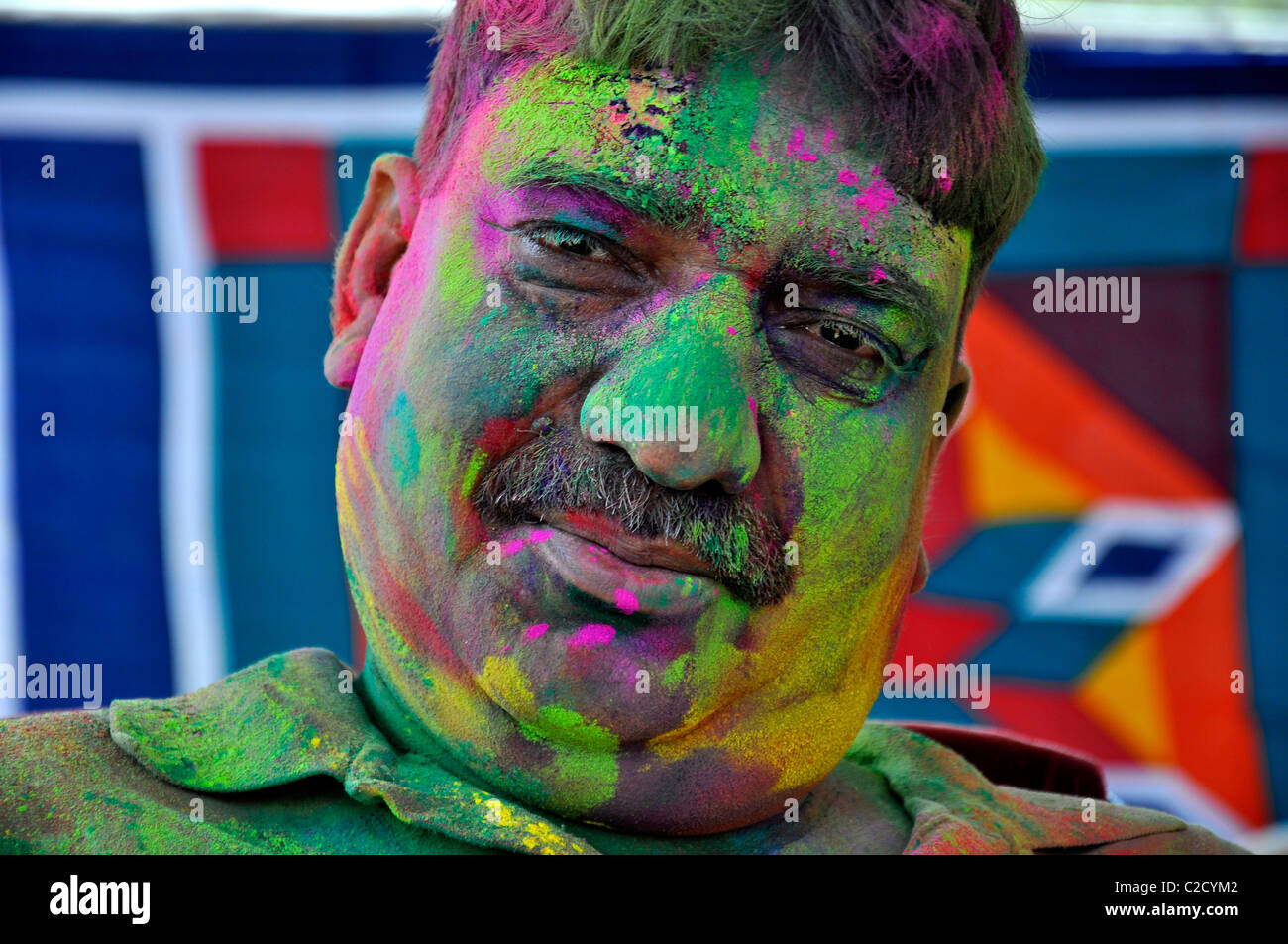 A close up of an indian having coloured face Stock Photo - Alamy