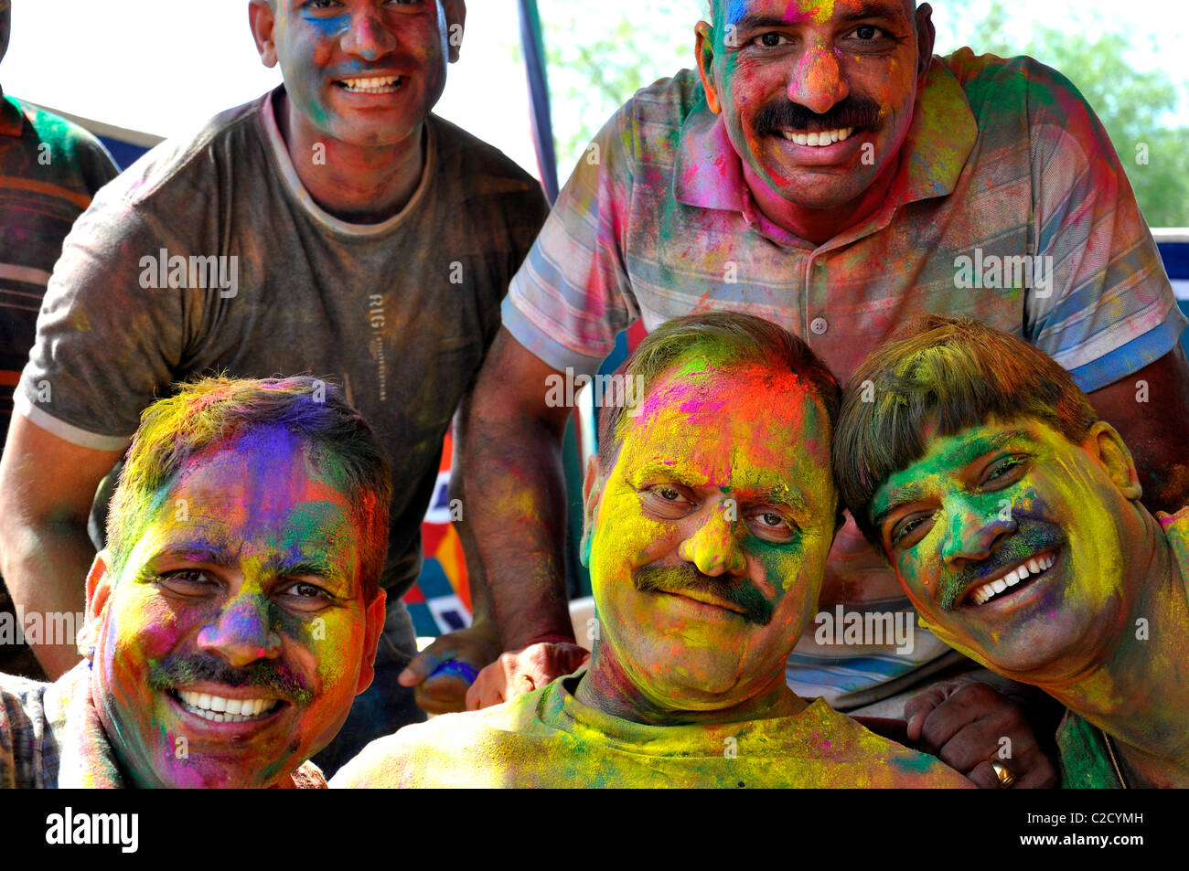 Holi celebration- gathering of friends Stock Photo - Alamy