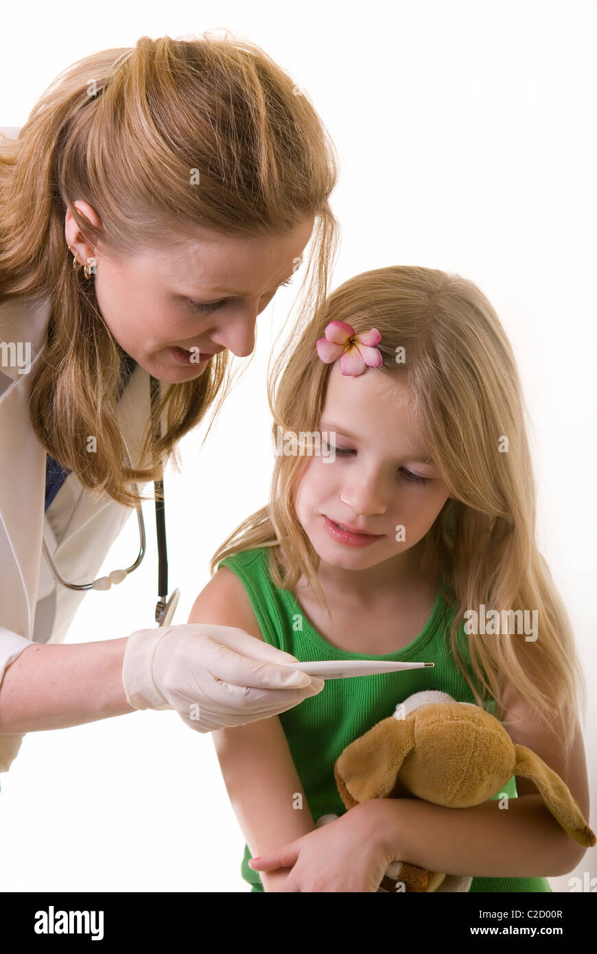 Little girl getting a check-up Stock Photo - Alamy