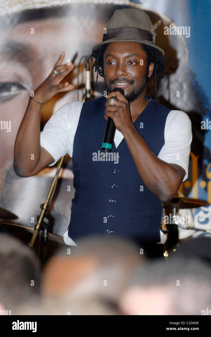 will.i.am signs copies of his new CD, 'Songs About Girls,' and performs ...