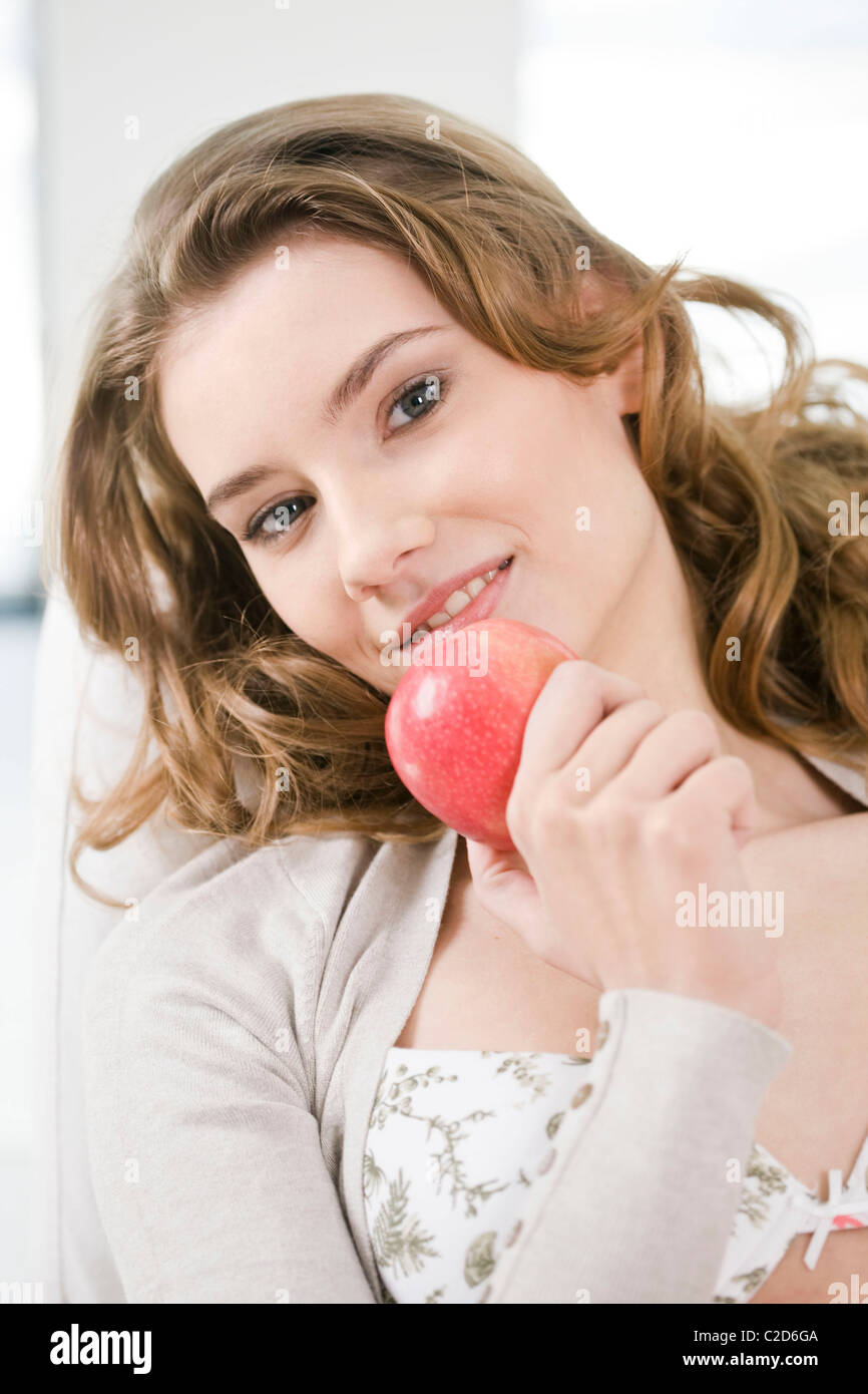 young woman eating apple Stock Photo - Alamy
