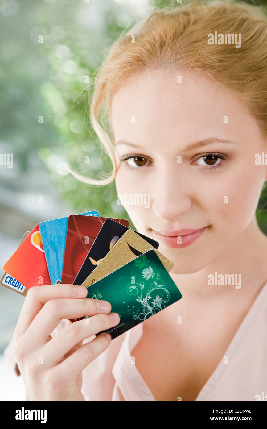 Woman with credit cards Stock Photo - Alamy