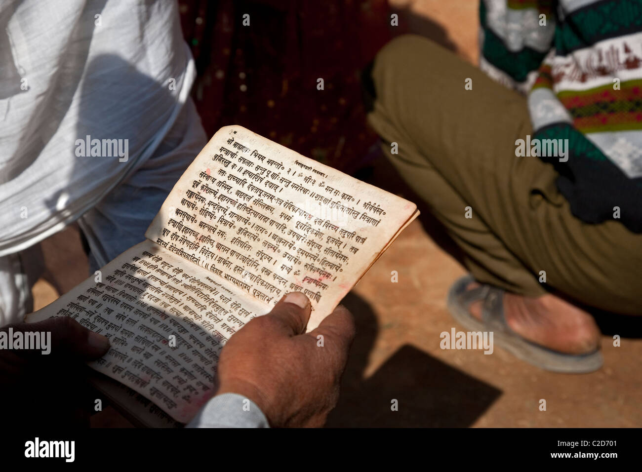 Man reading a text written in Nepali. Kathmandu. Nepal Stock Photo - Alamy