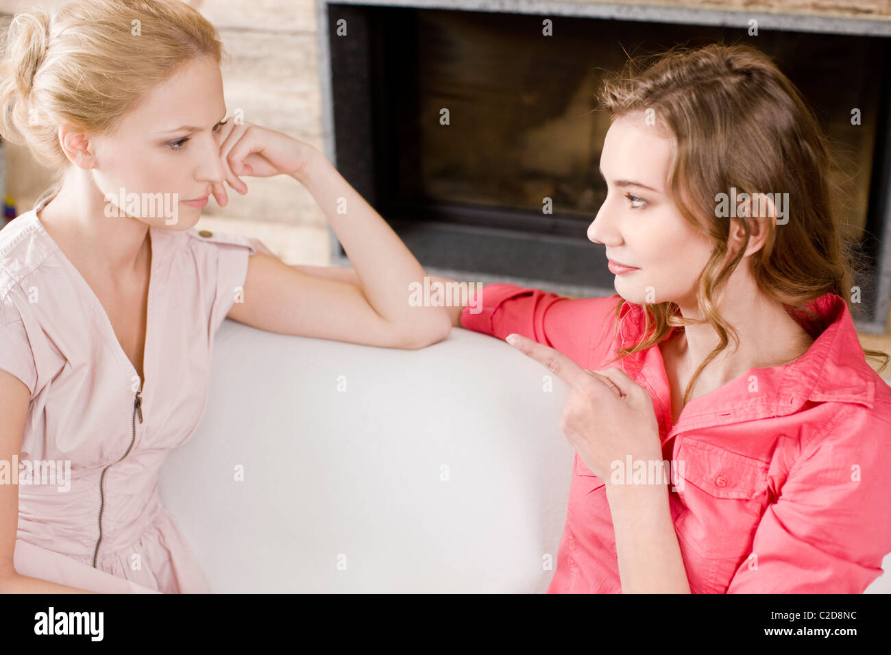 Two women having conversation Stock Photo - Alamy