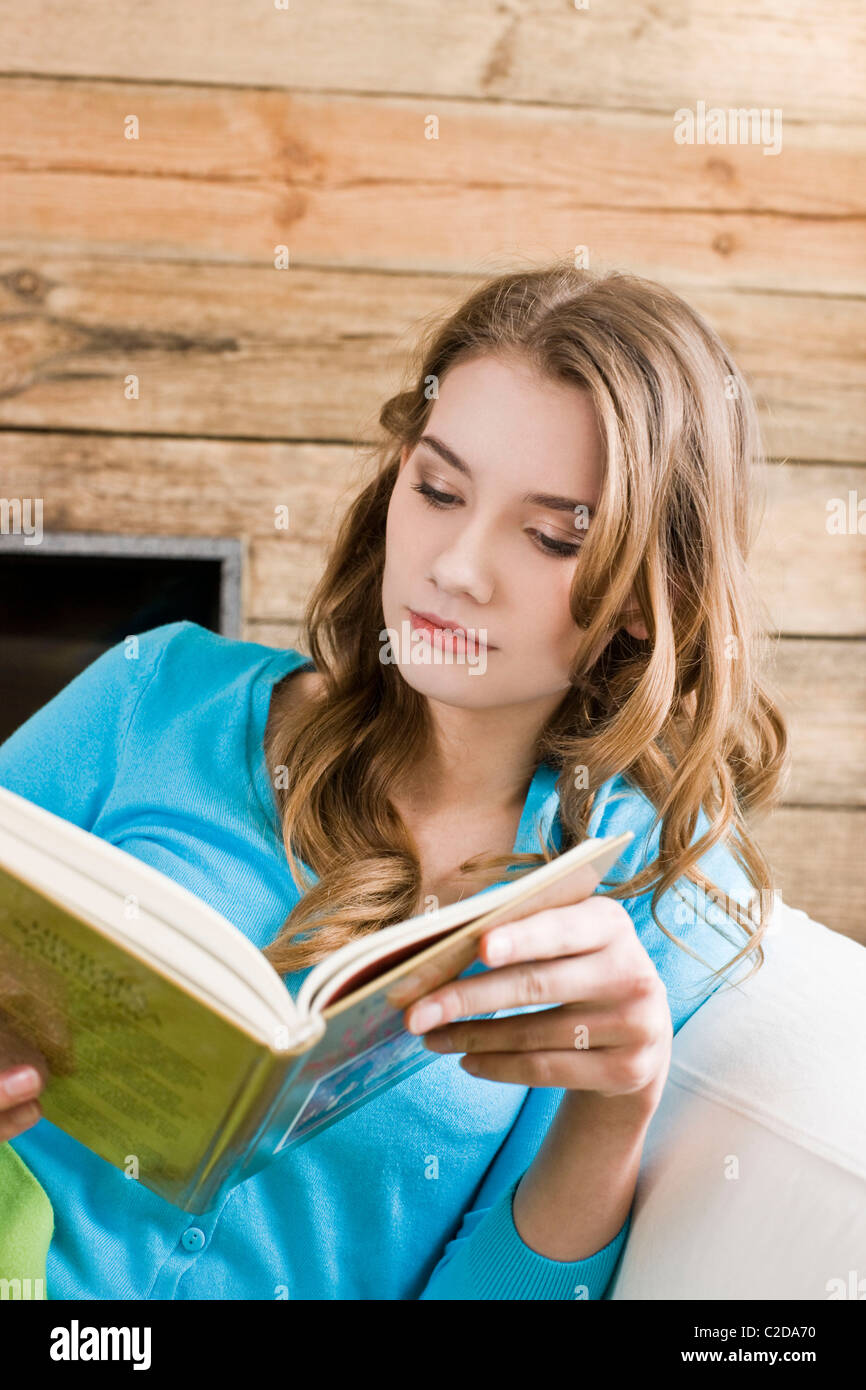 Woman reading book Stock Photo - Alamy