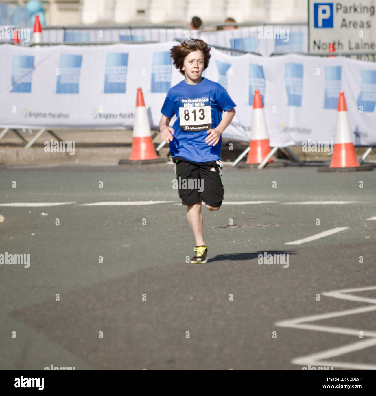 Boy taking part in a mini marathon Stock Photo - Alamy