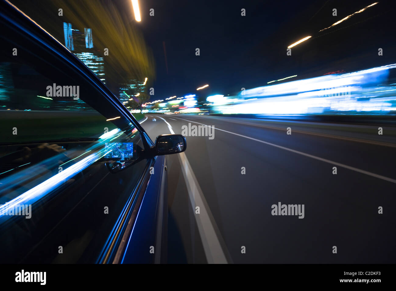 The car moves at great speed at the night Stock Photo - Alamy