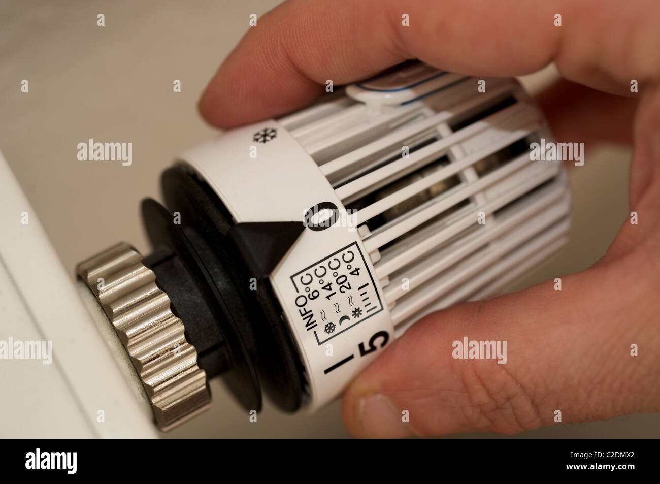 Household radiator heat control set to zero Stock Photo - Alamy