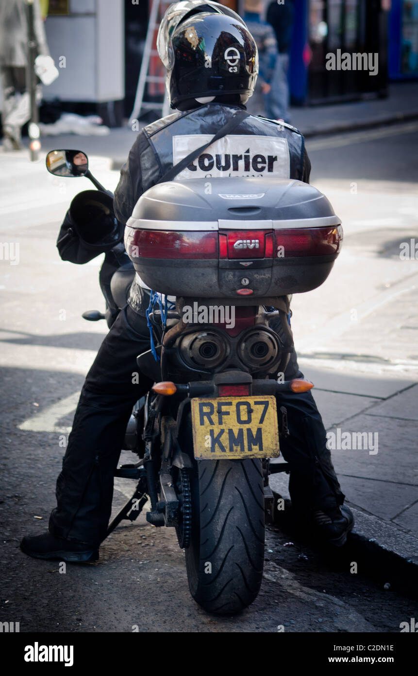 Motorcycle courier hi-res stock photography and images - Alamy
