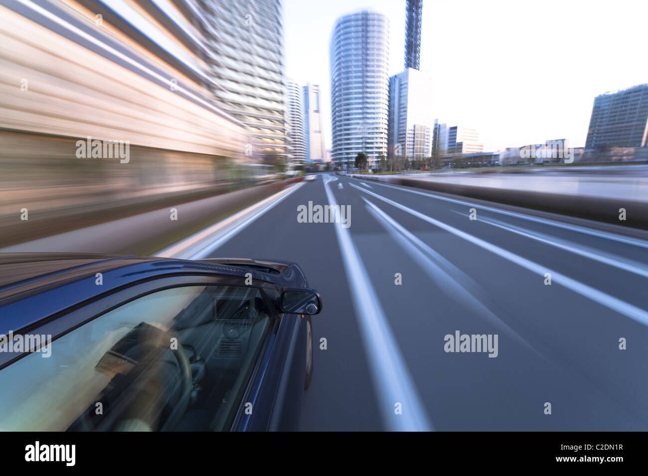 The car moves at great speed at the evening Stock Photo - Alamy