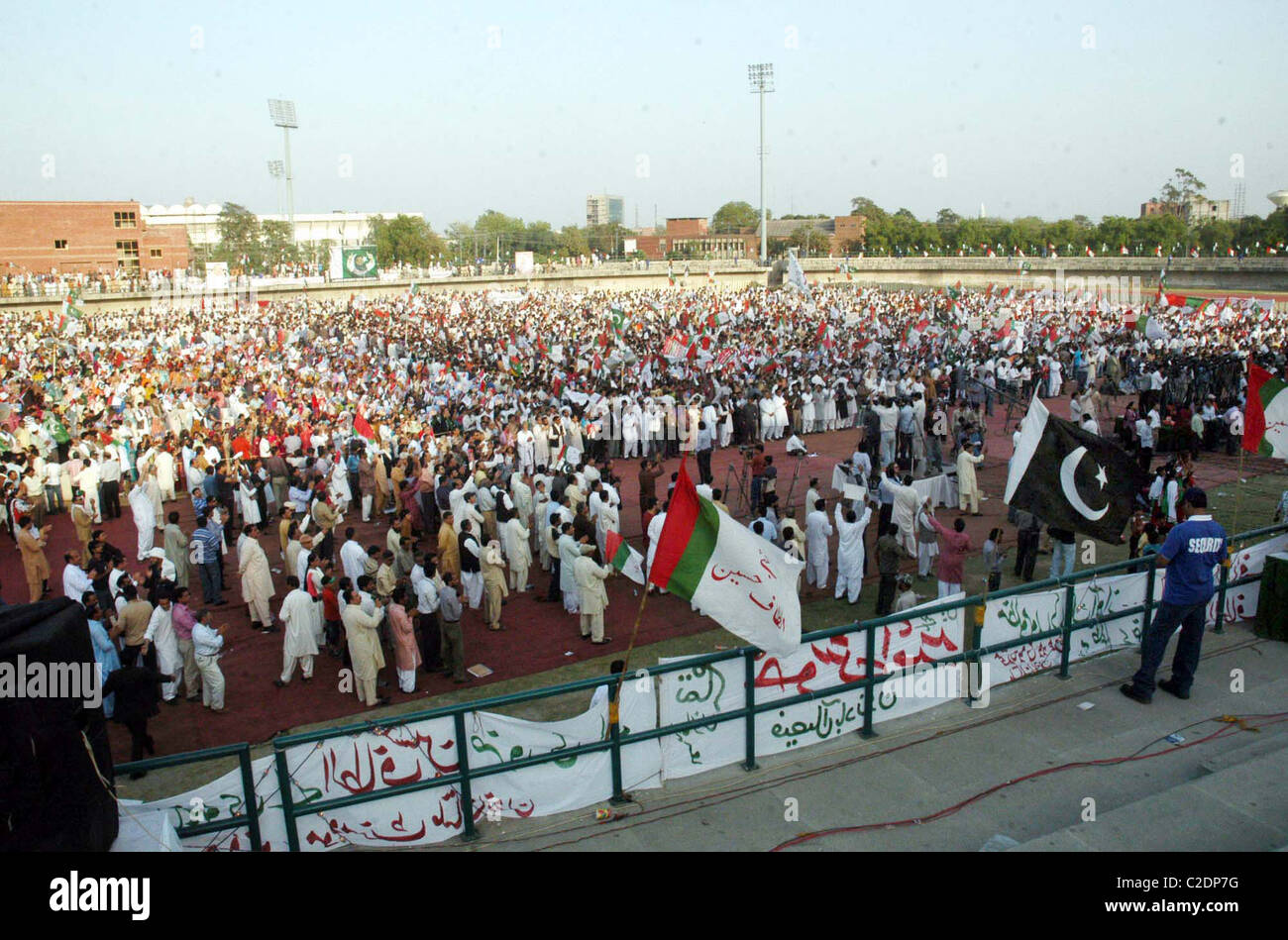 Supporters of Muttehda Qaumi Movement (MQM) are present during public ...