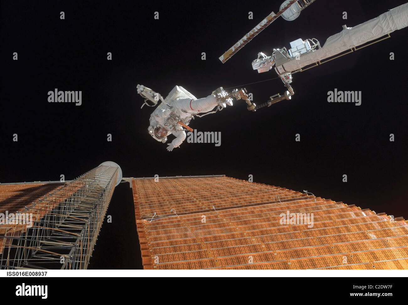 Astronaut participates in extravehicular activity Stock Photo - Alamy