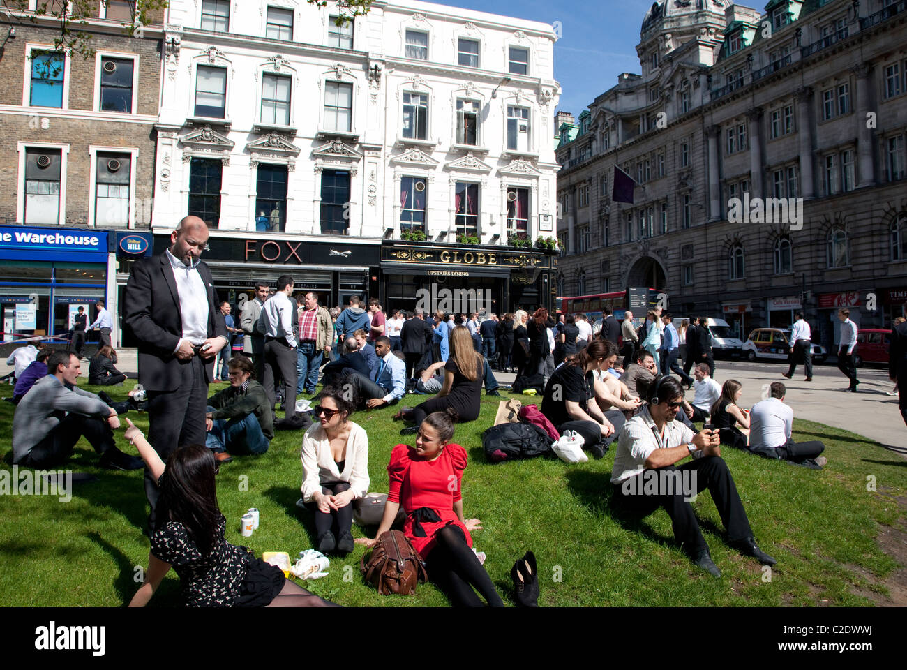 City workers drinking at lunchtime outside pub, London Stock Photo - Alamy
