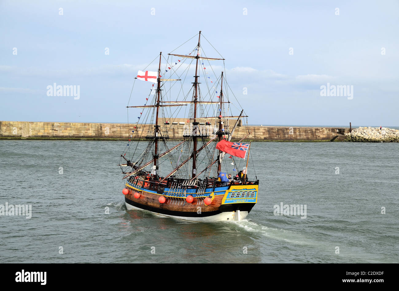 Tourist pirate ship Bark Endeavour leaving Whitby harbour, North ...
