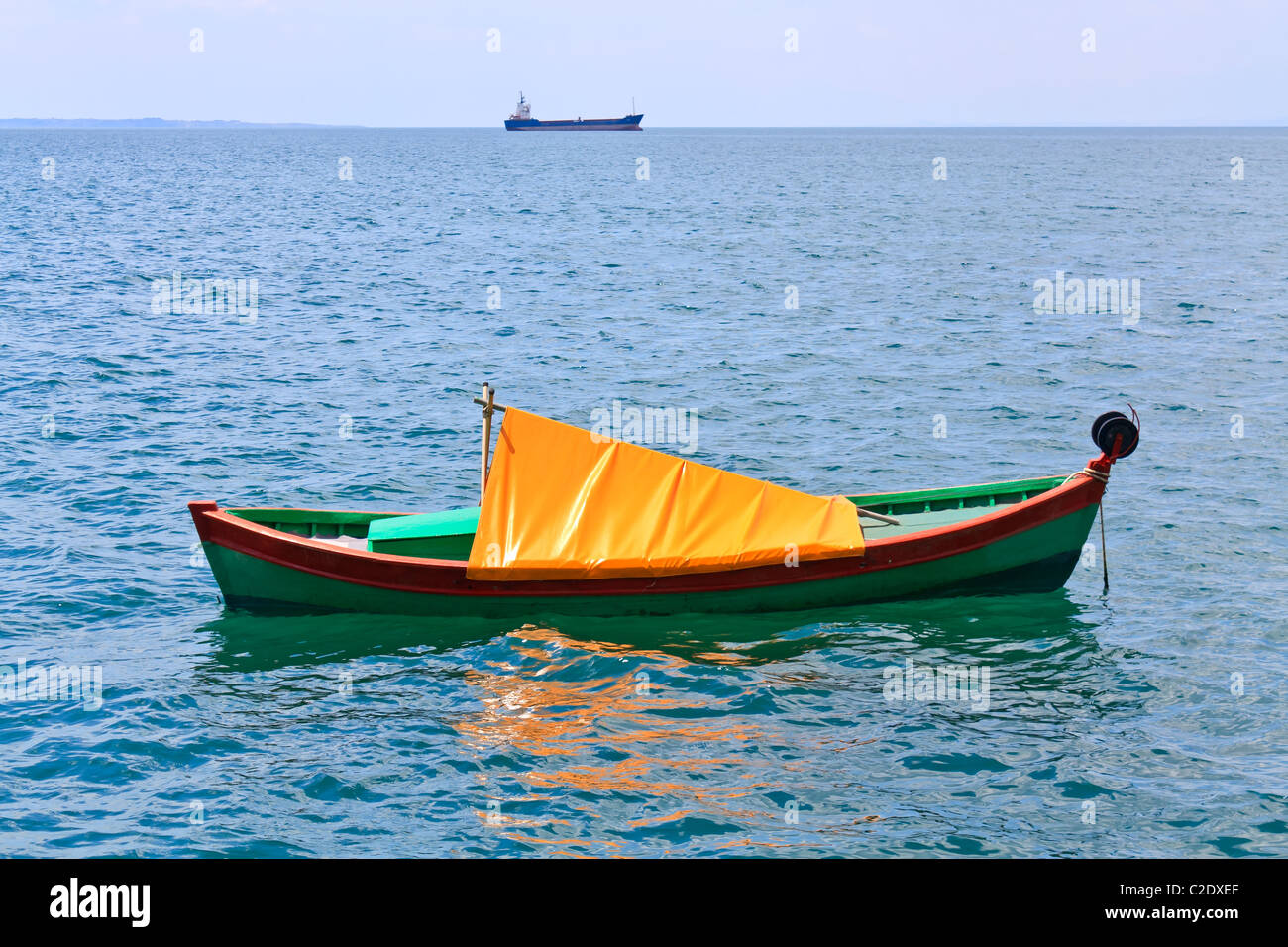 Distant fishing boat hi-res stock photography and images - Alamy