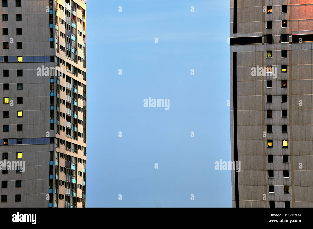 Lights go on in tower block windows in Gorbals, Glasgow, as night falls ...