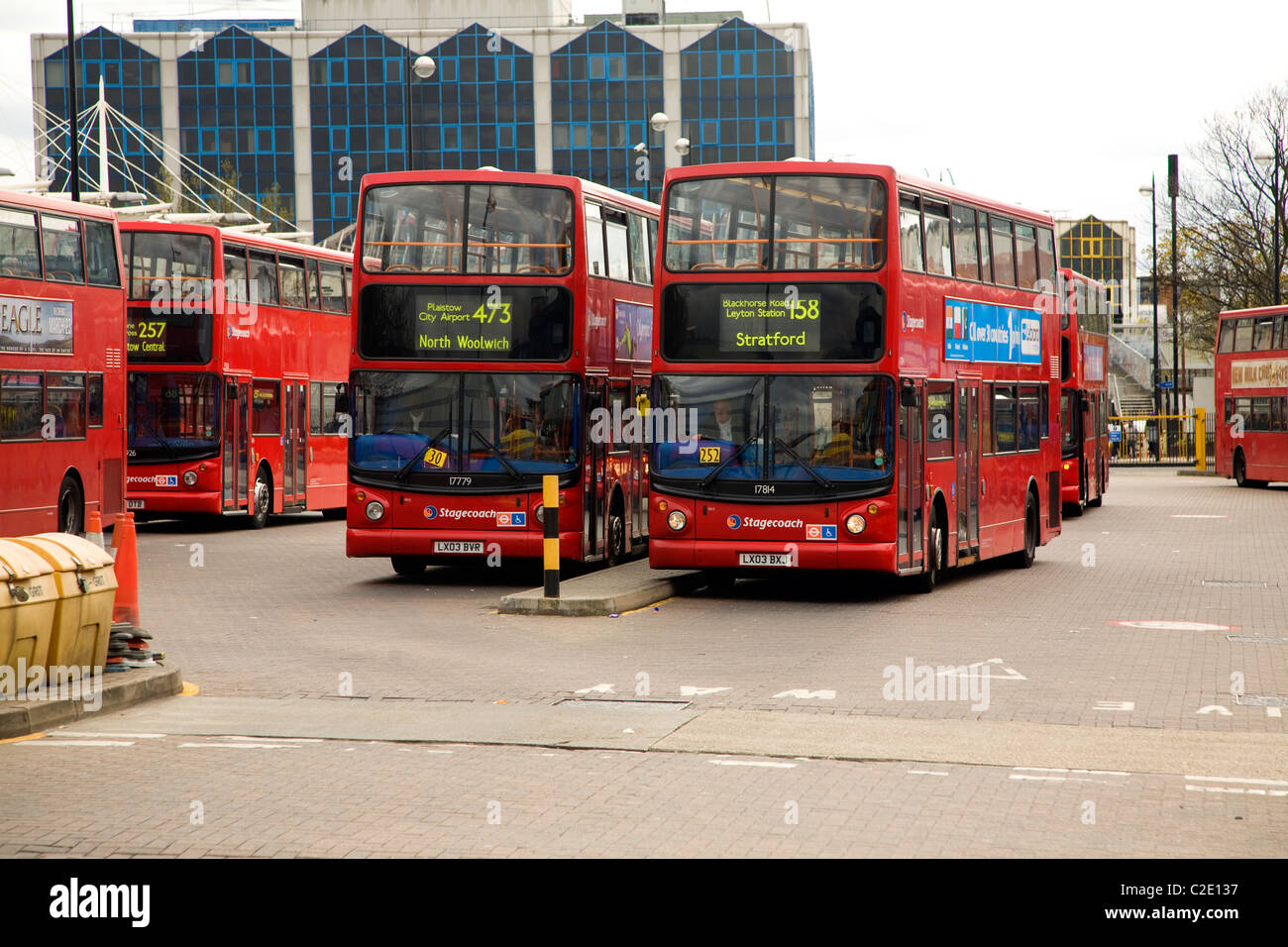 Red double decker buses terminus bus station Newham London Stock Photo ...