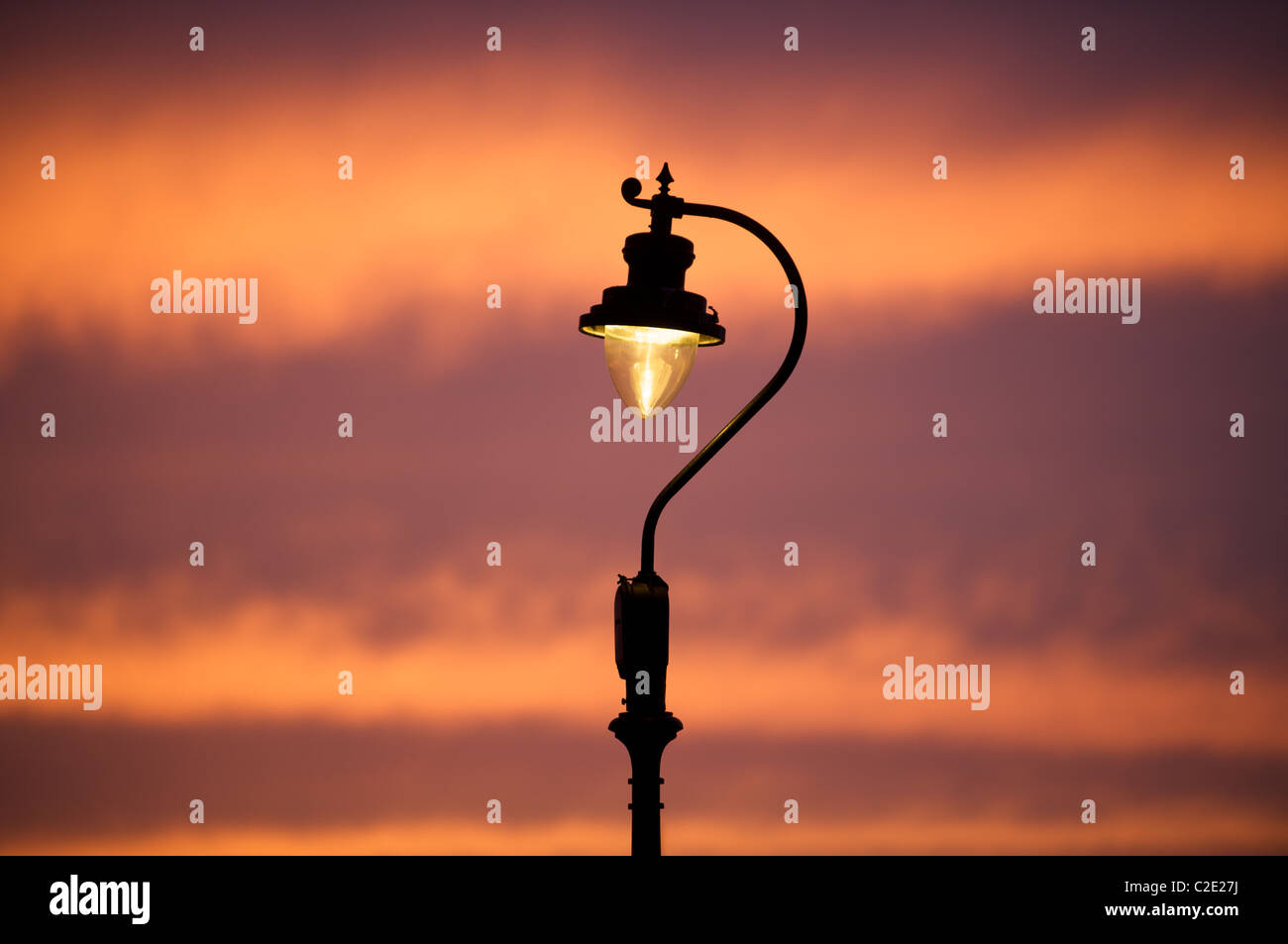 Street light with red sky Stock Photo - Alamy