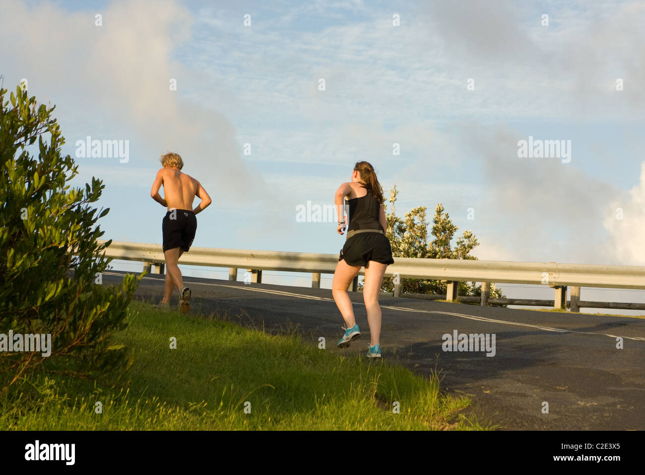 Female running up a hill hi-res stock photography and images - Alamy