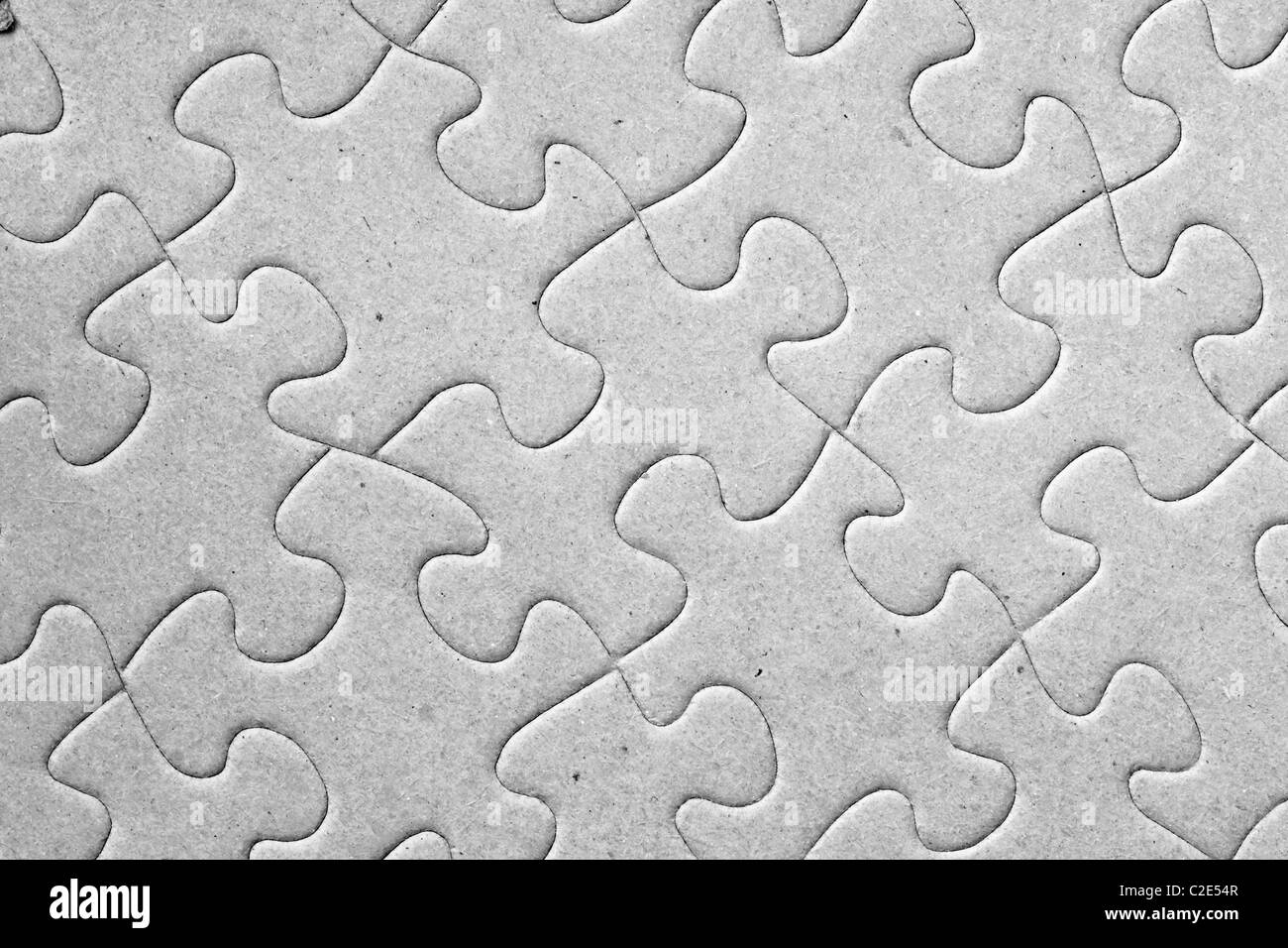 Blank grey complete cardboard jigsaw puzzle shot at an angle, great ...