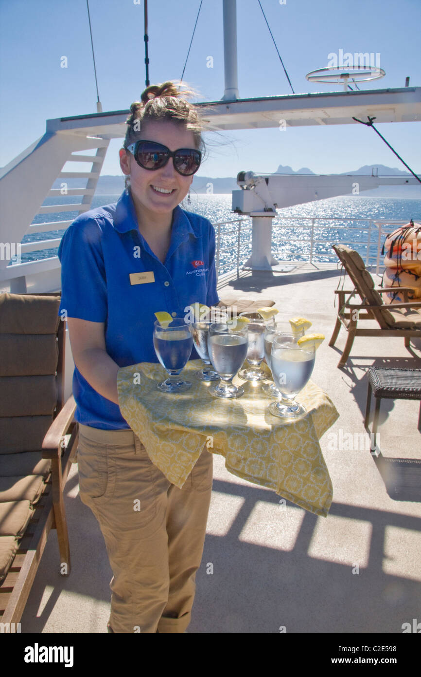 Safari Quest hotel manager, Sarah Weyerts, delivers cool beverages ...