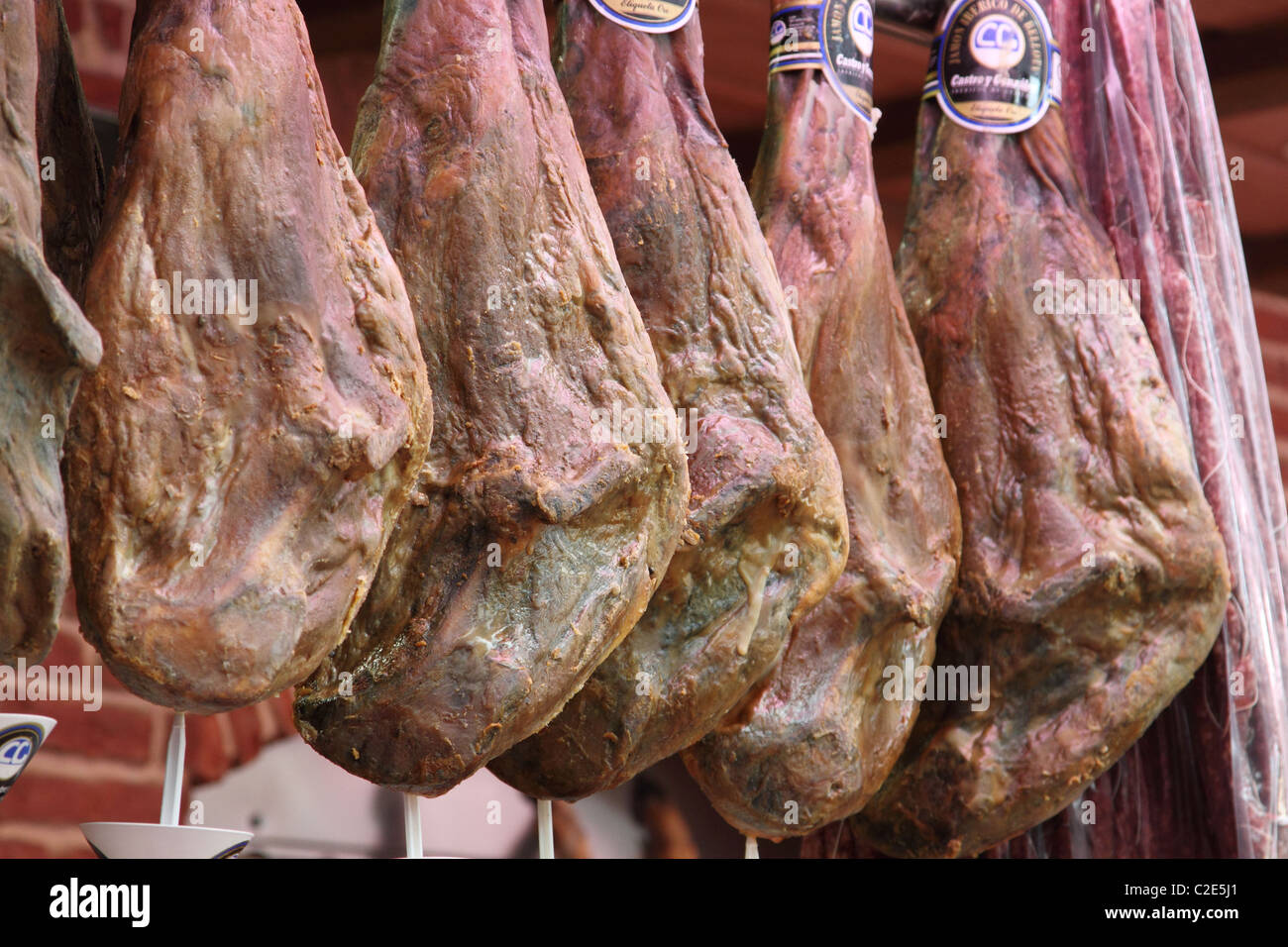 Market ham stall Stock Photo - Alamy