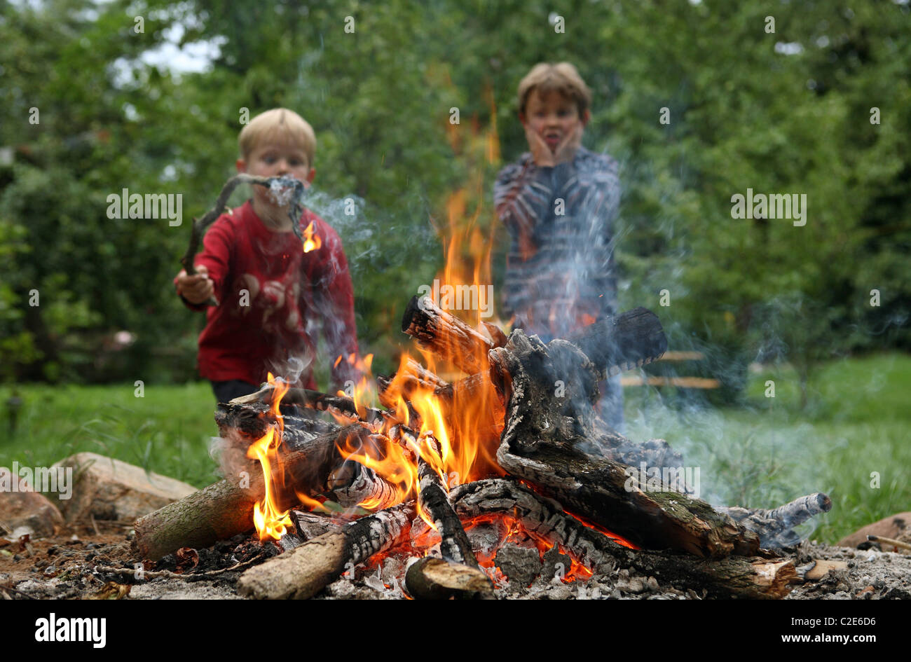 Children at a campfire Stock Photo - Alamy