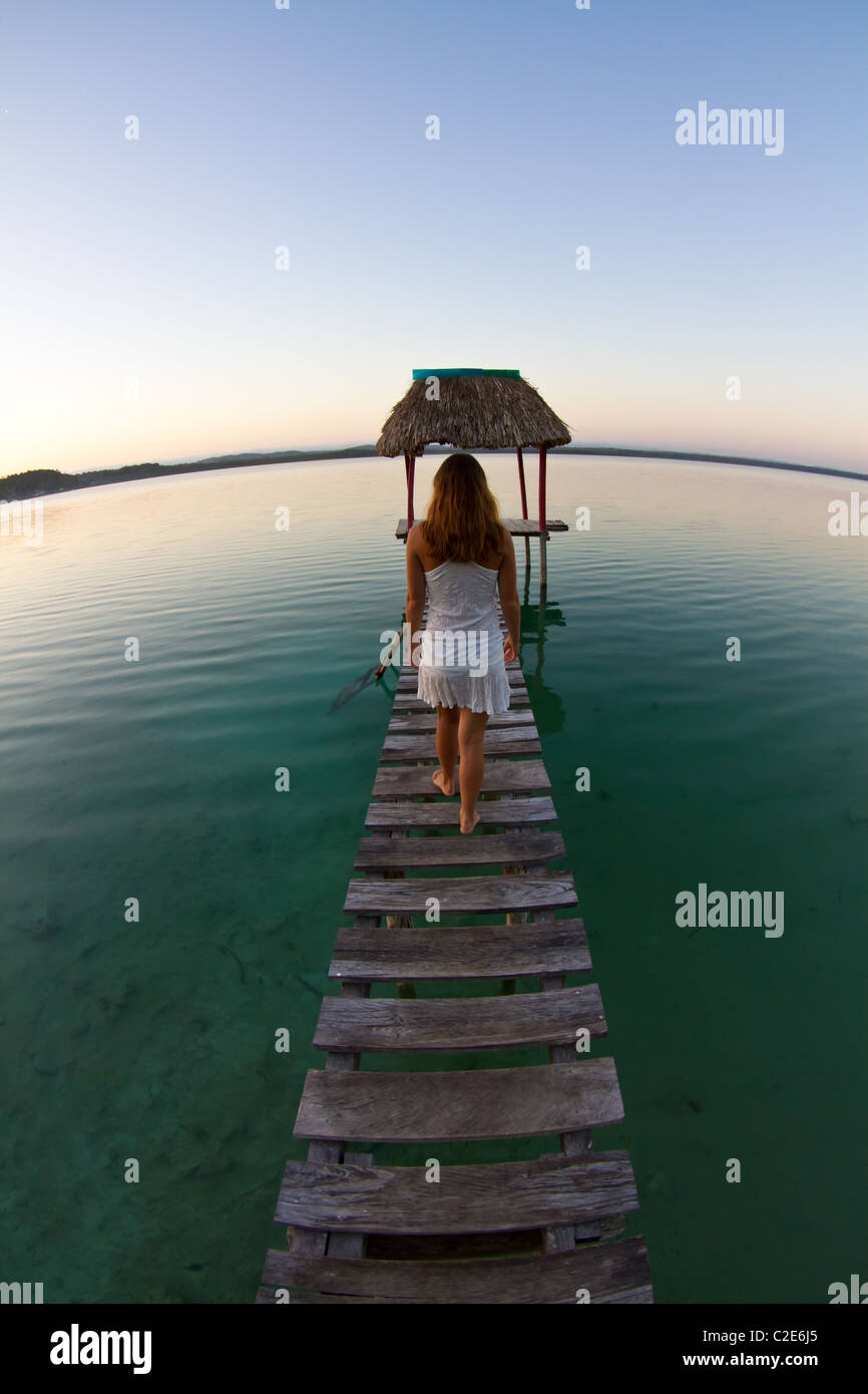 A beautiful girl enjoys a beautiful sun rise Stock Photo - Alamy