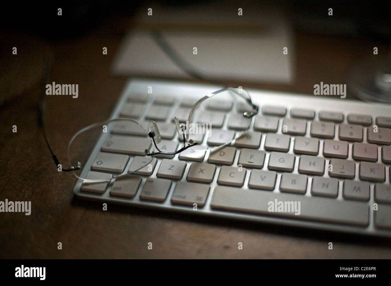 keyboard with frameless glasses Stock Photo - Alamy