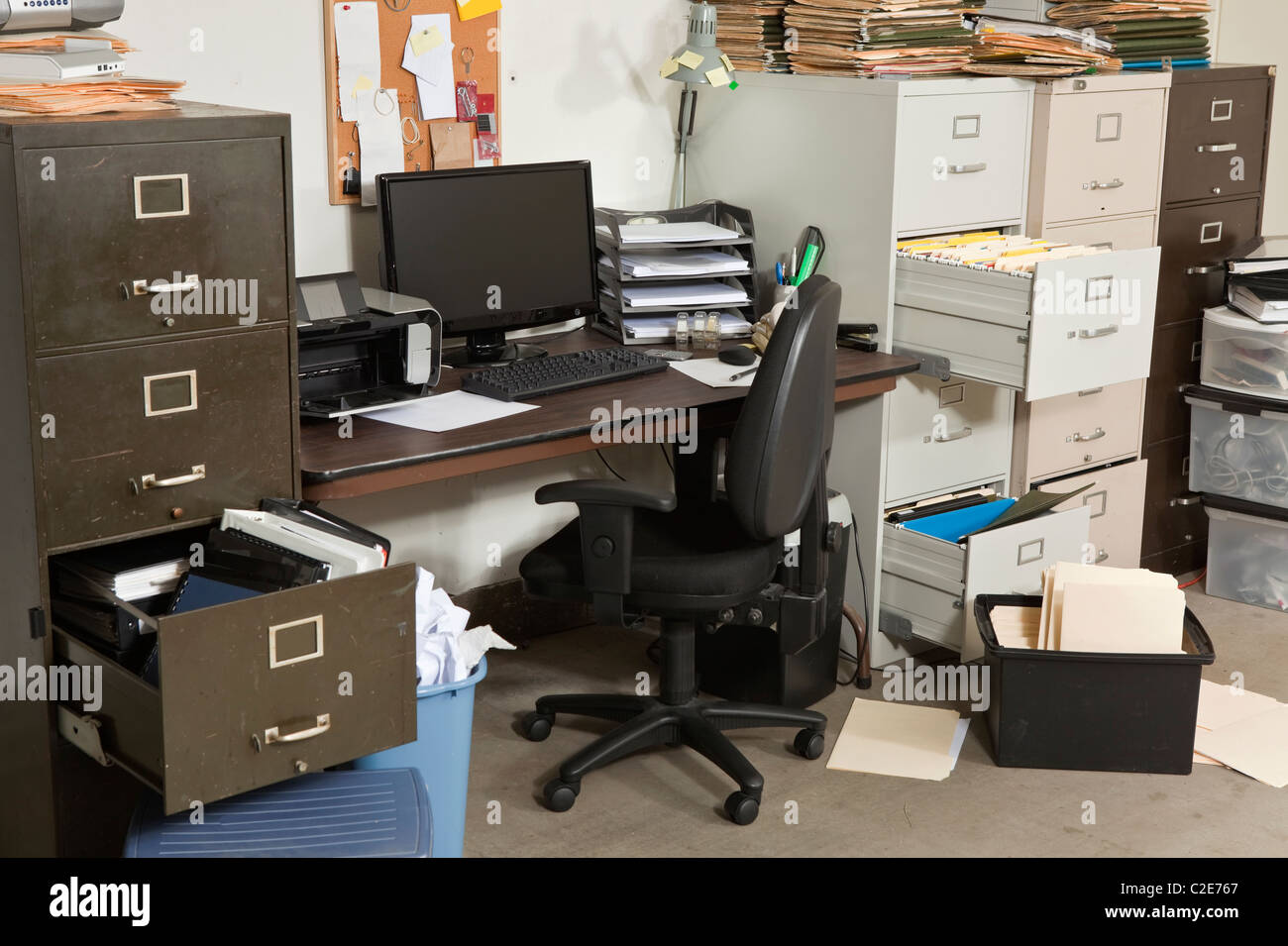 Very messy office with piles of files Stock Photo - Alamy