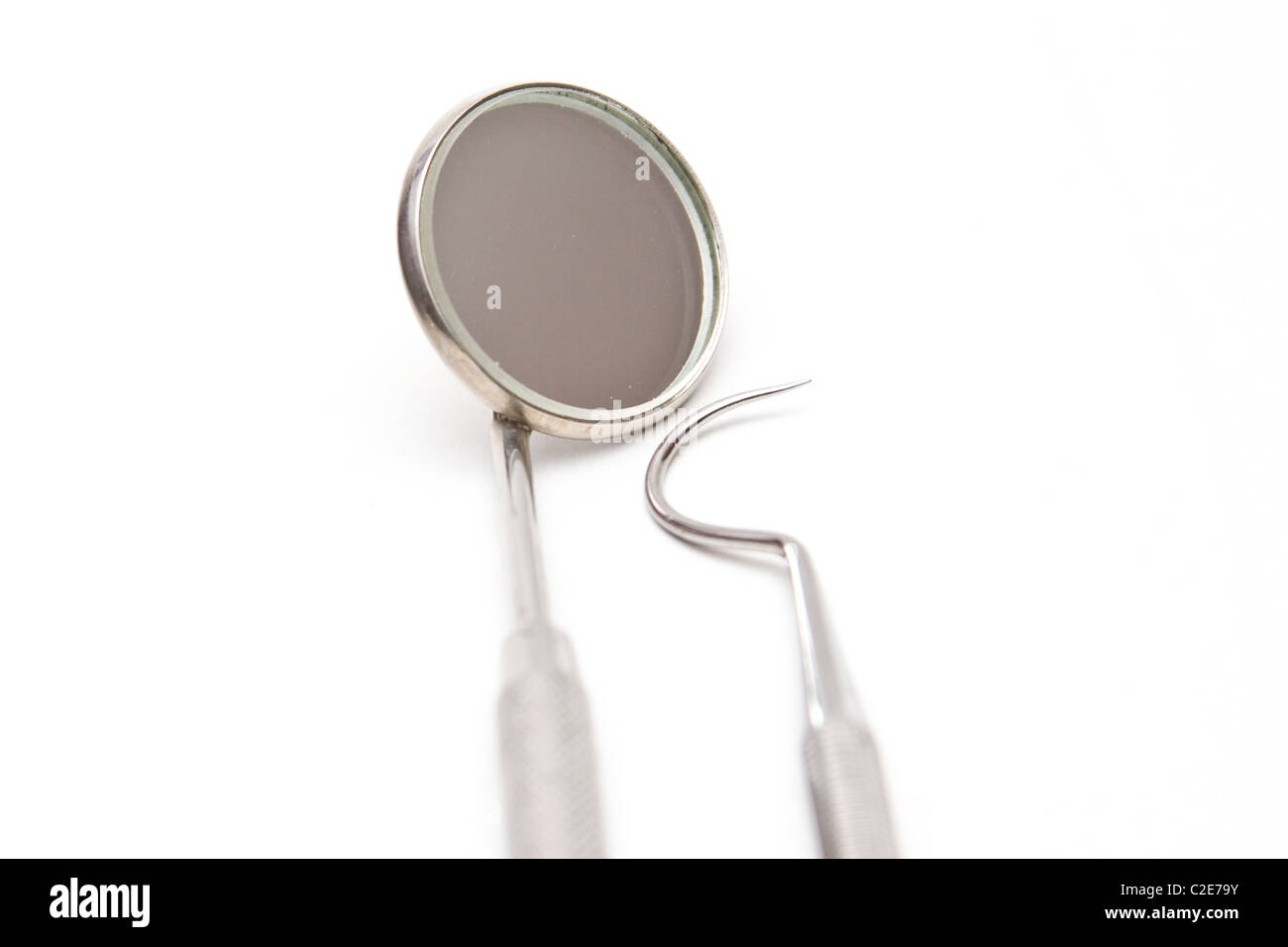 Dental instruments isolated on a white background Stock Photo - Alamy