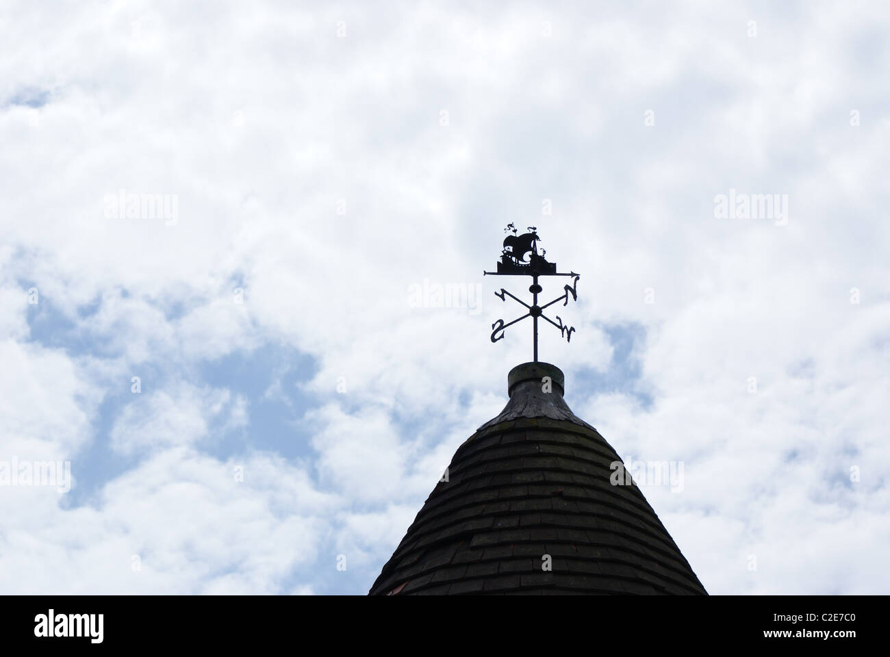 Compass on roof of tower Stock Photo - Alamy