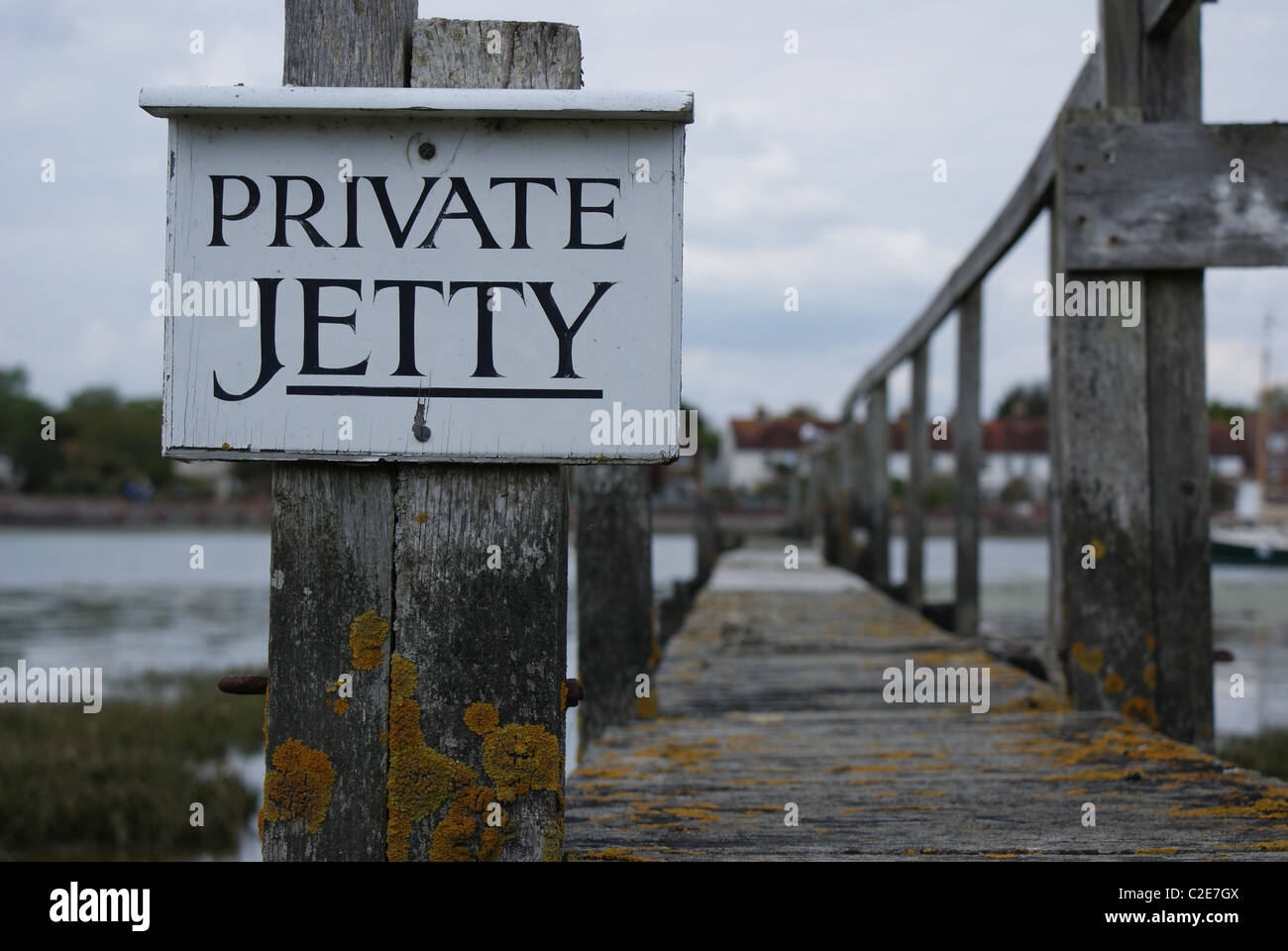Private jetty heading to water Stock Photo - Alamy
