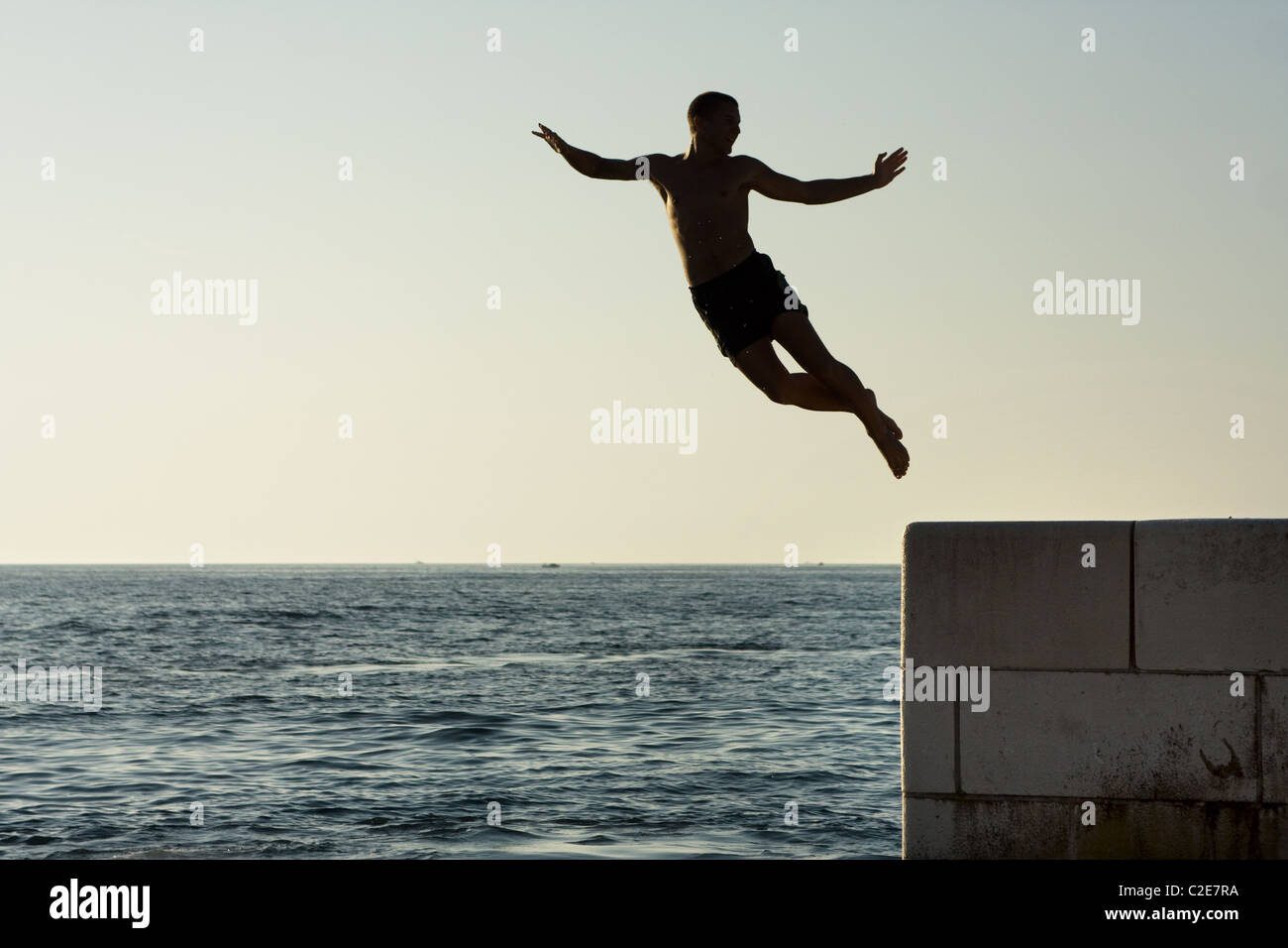 Man diving in style into sea off Zadar Stock Photo - Alamy