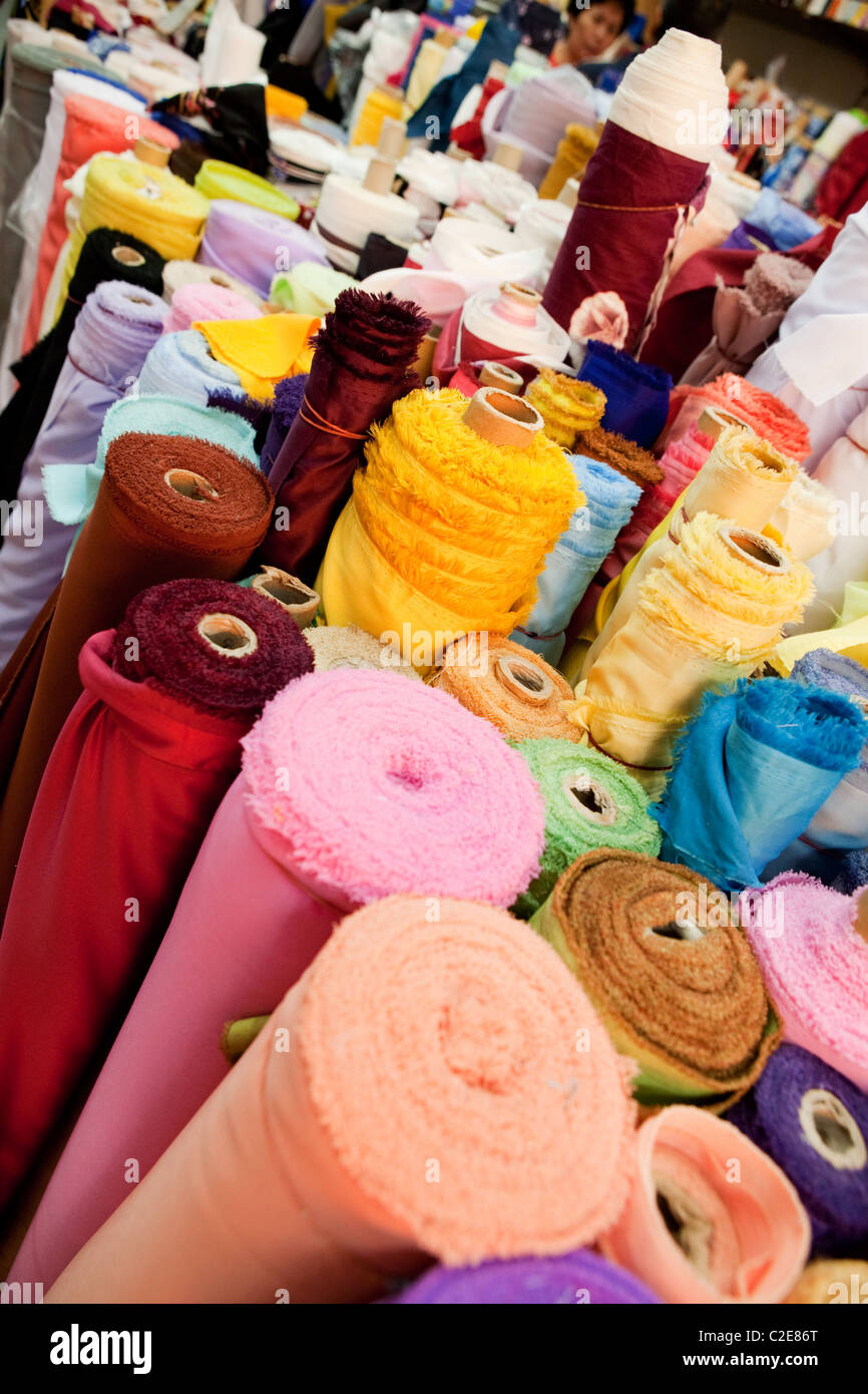 Rolld of cloth at a textile store, bulk Stock Photo - Alamy