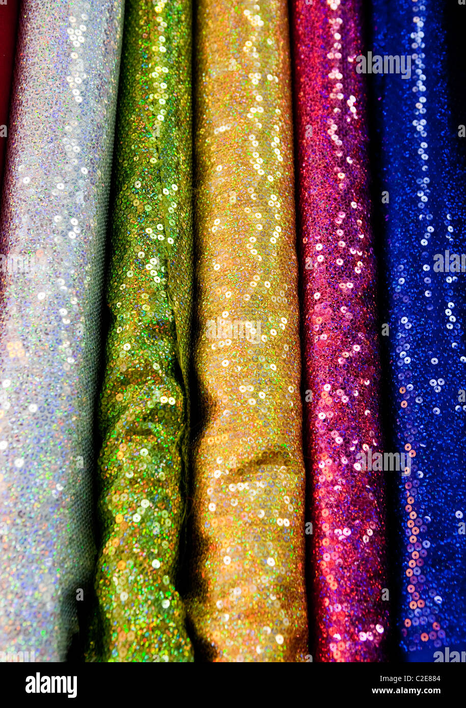 An abstract background of various rolls of cloth Stock Photo - Alamy
