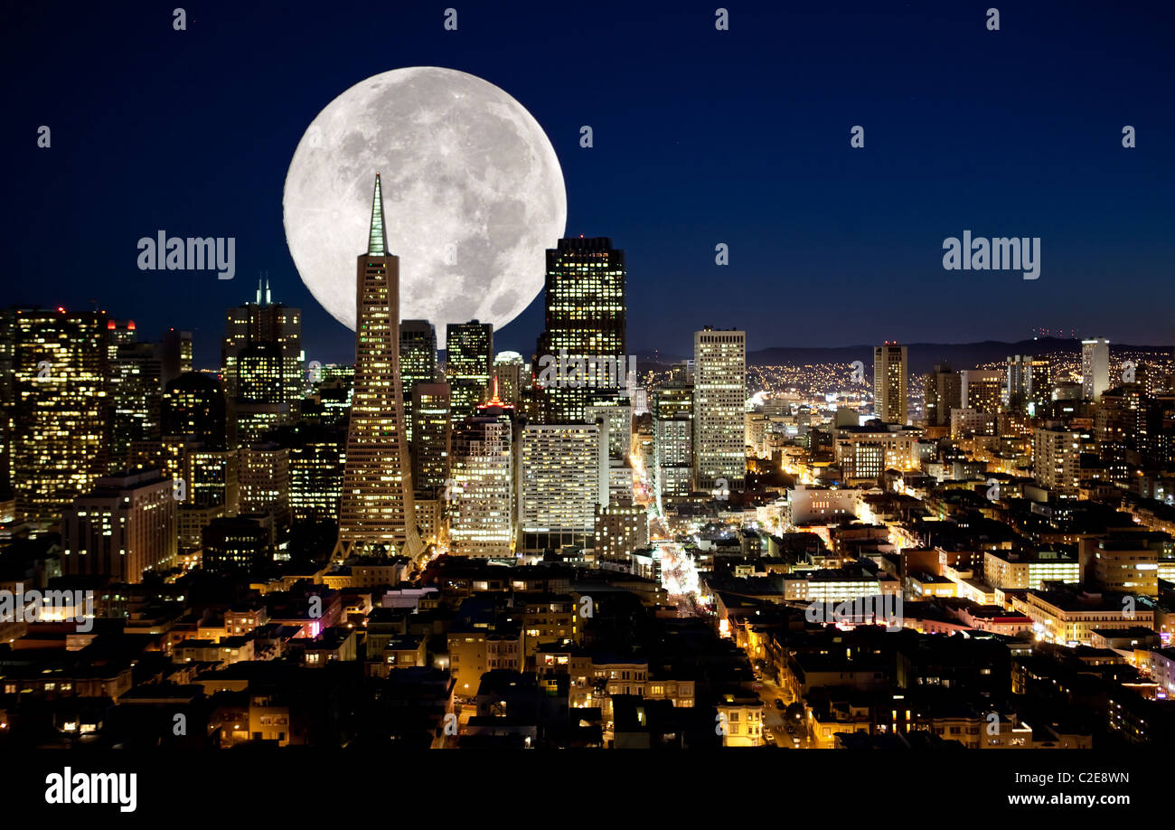 A full moon over a urban metropolis Stock Photo - Alamy