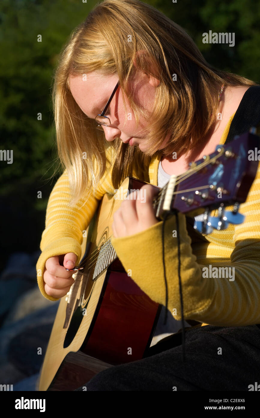 Teen Playing Guitar Stock Photo - Alamy
