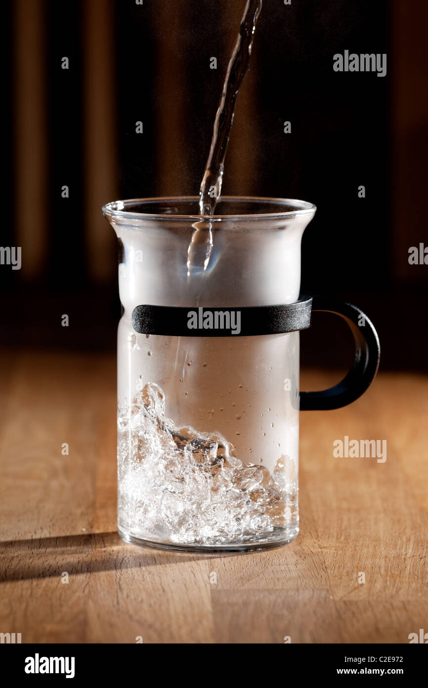 Cup being filled with water hi-res stock photography and images - Alamy