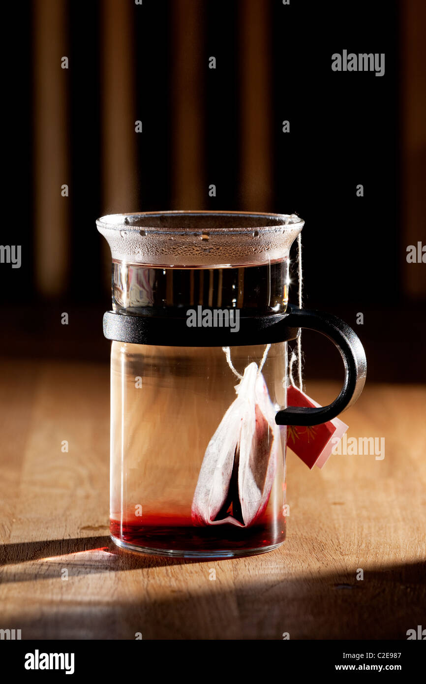 Tea bag in hot water hi-res stock photography and images - Alamy