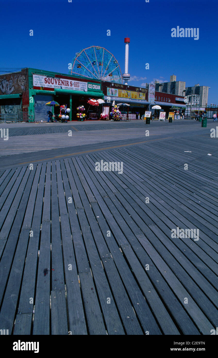 Boardwalk at Coney Island on Long Island has historic funfair rides, a ...