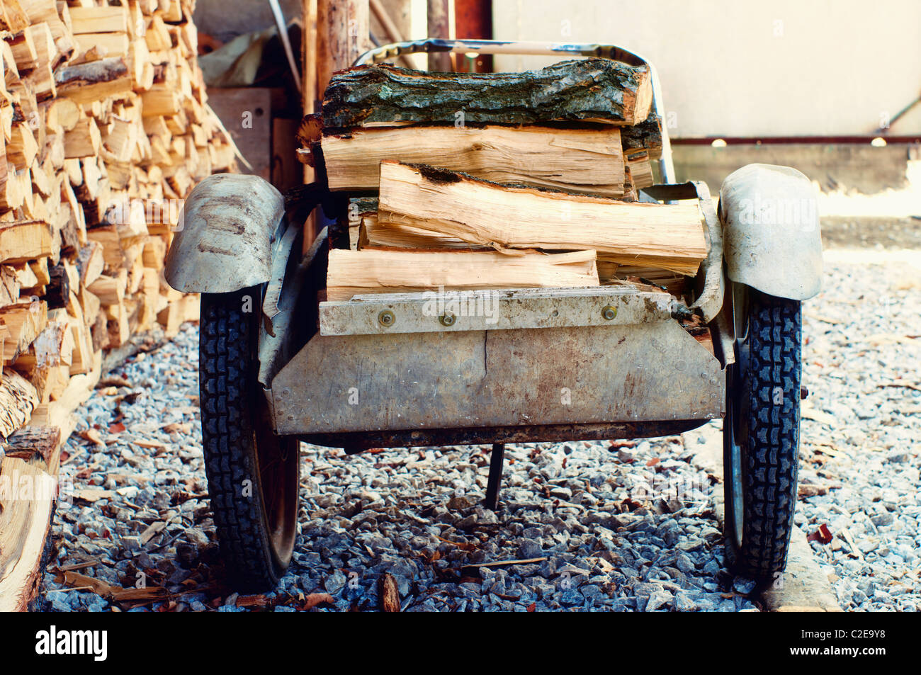 Log wheelbarrow wood hi-res stock photography and images - Alamy